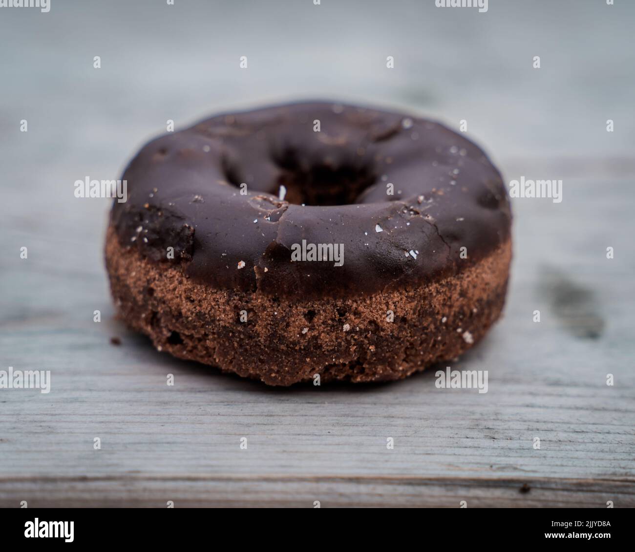 A close-up shot of a chocolate-glazed donut Stock Photo - Alamy