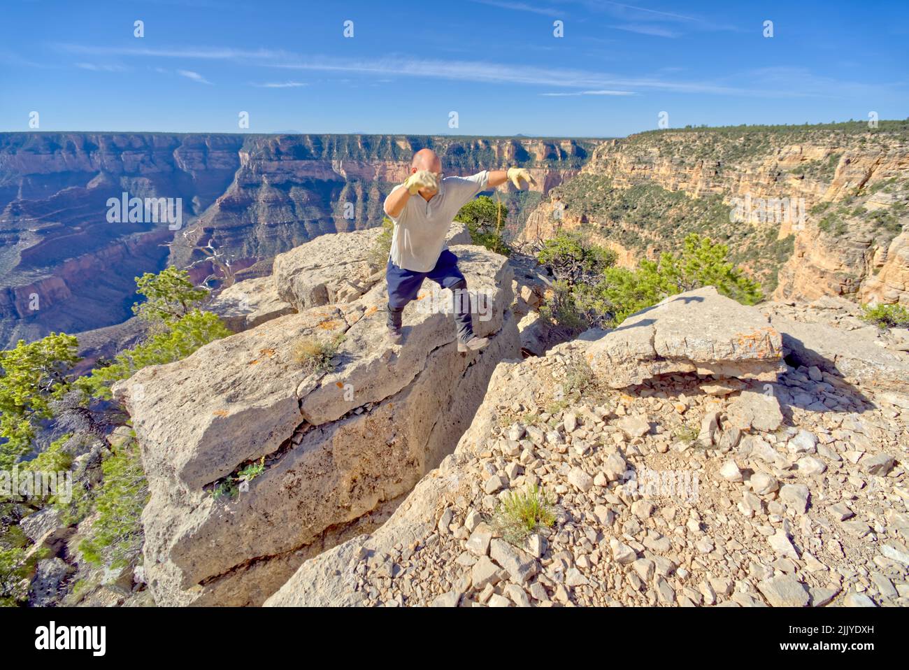 Jumping across canyon hi-res stock photography and images - Alamy