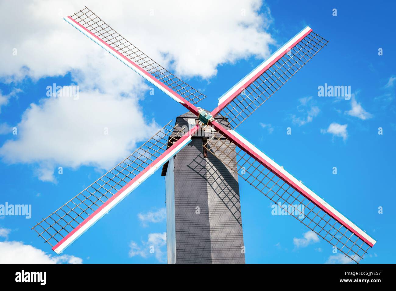 Rustic wooden windmills in idyllic Bruges public park, Belgium Stock ...