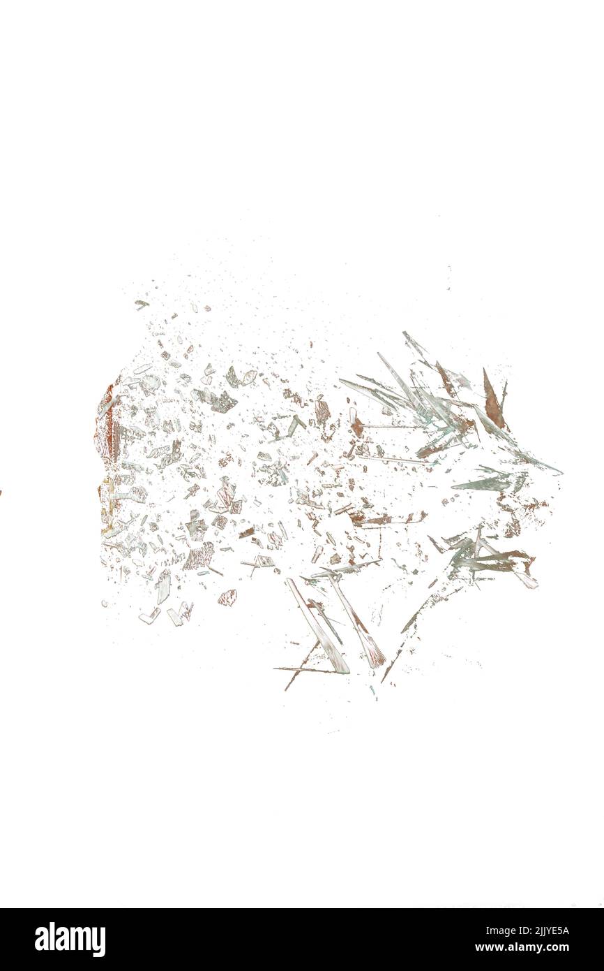 Smashed and shattered window fragments in mid air on white background ...