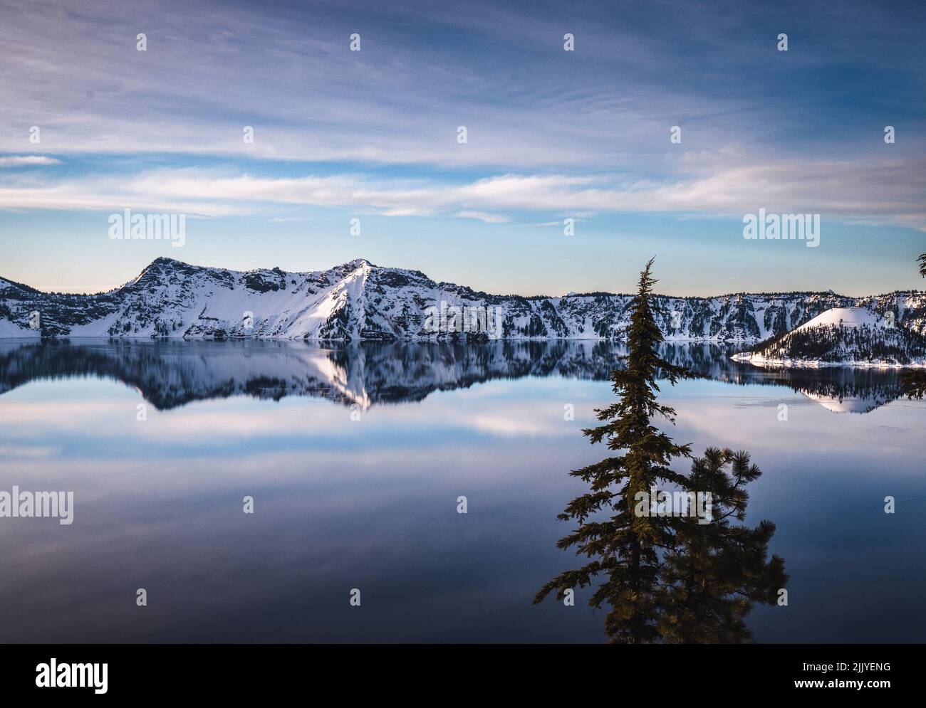 Crater Lake Oregon reflection in winter at twilight Stock Photo - Alamy