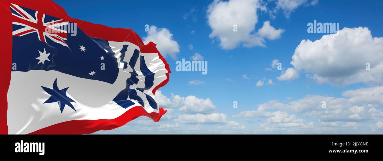 official flag of Australian Honour Austria at cloudy sky background on ...