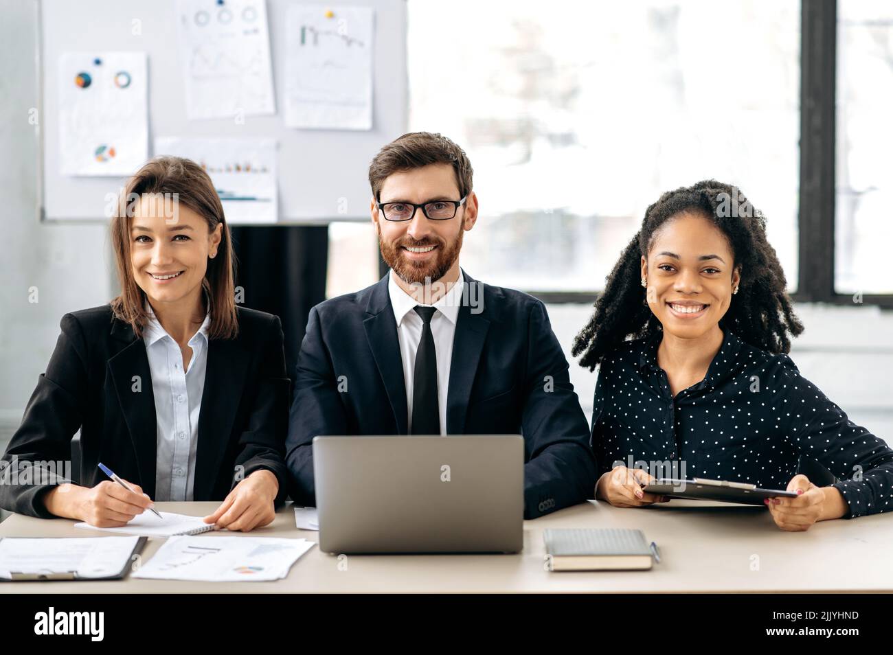 Creative business team in the office. Positive successful smart ...