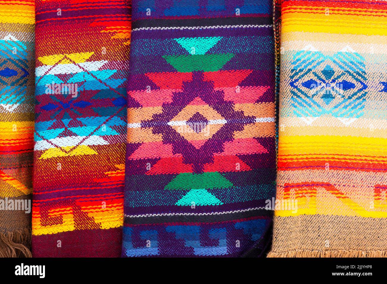 Group of ponchos in the traditional market of Colombia Stock Photo - Alamy