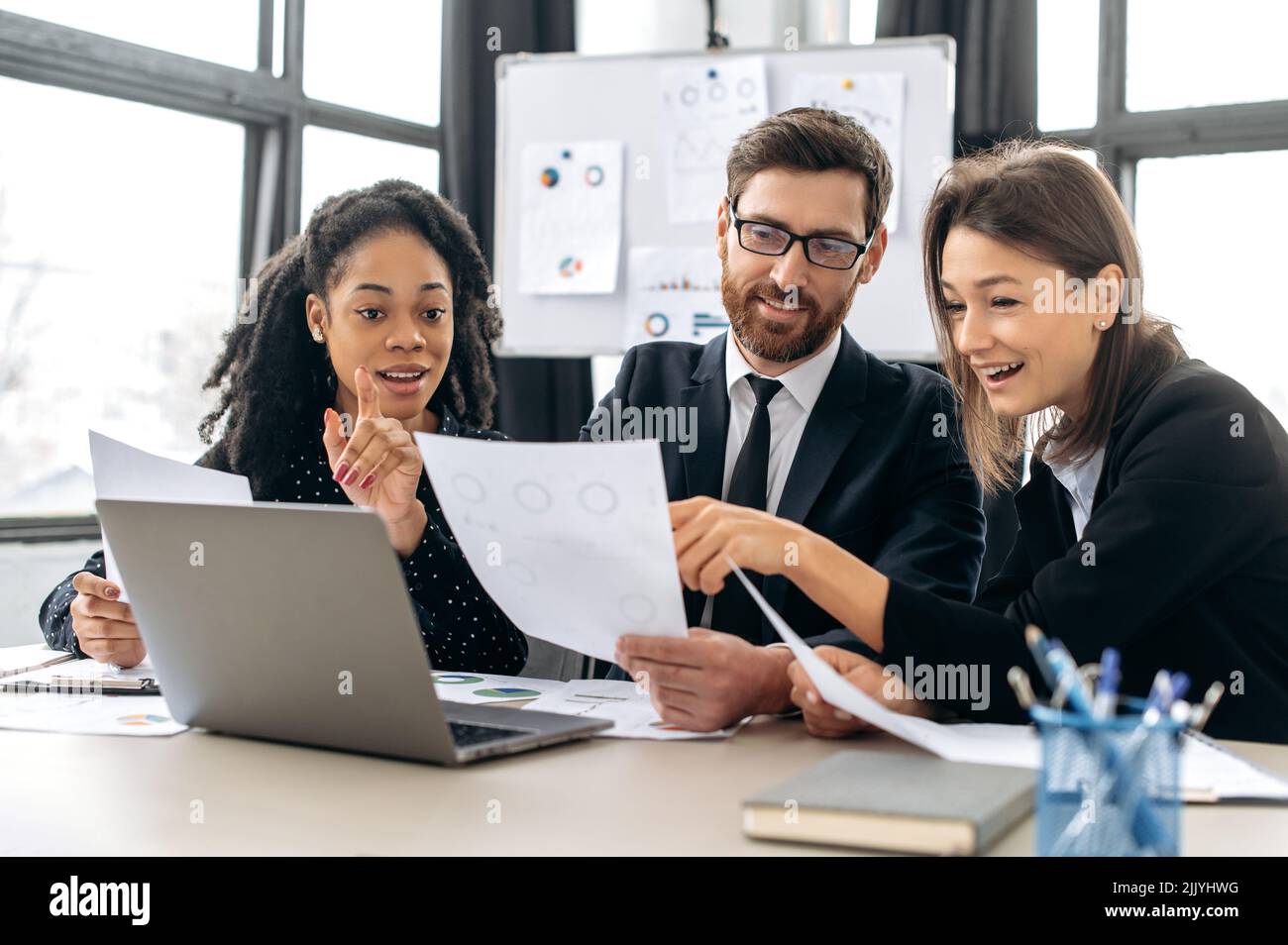Business partners working together on a project. Multiracial colleagues ...