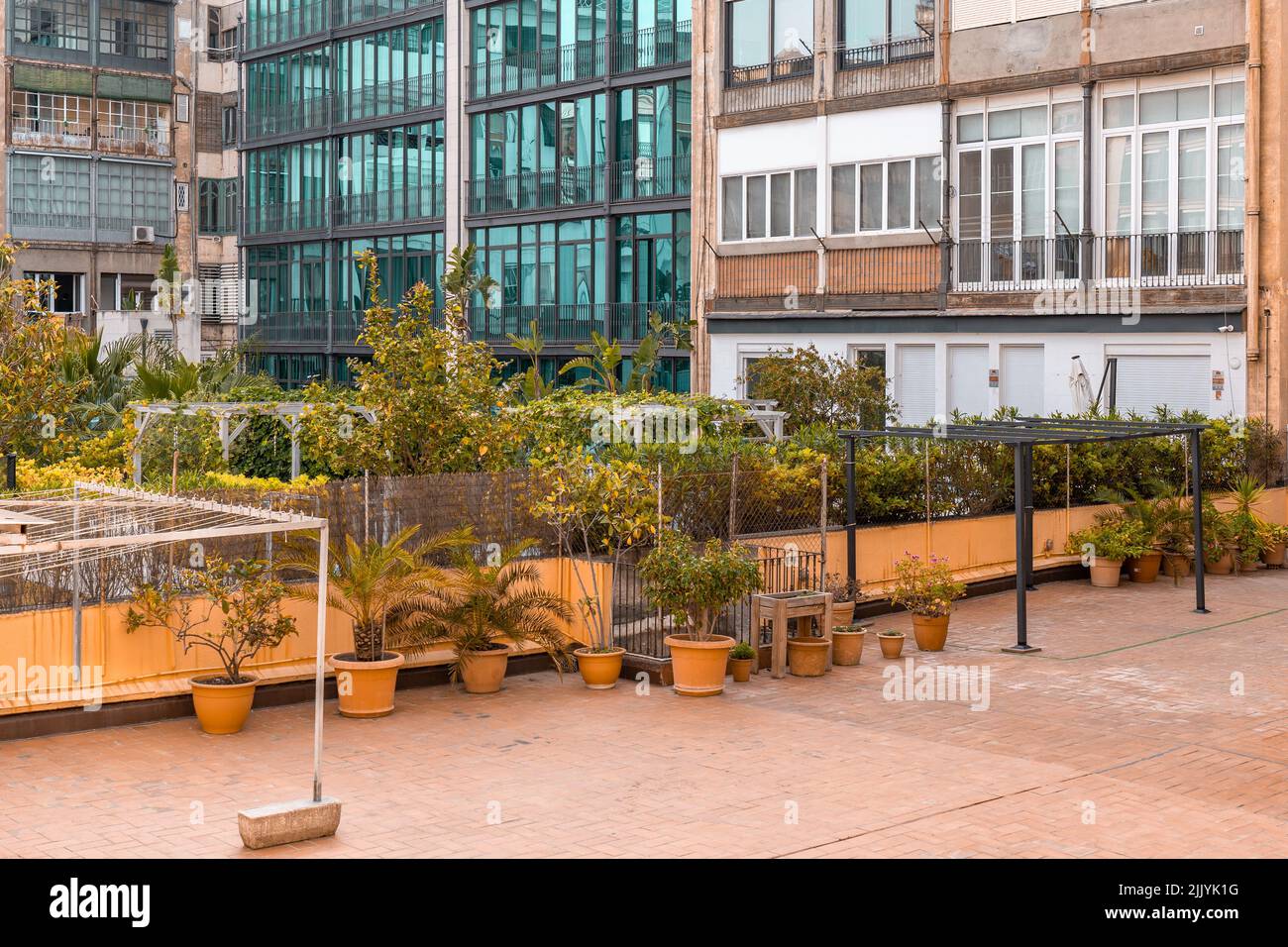 patio or courtyard between apartment buildings in Barcelona, Spain ...