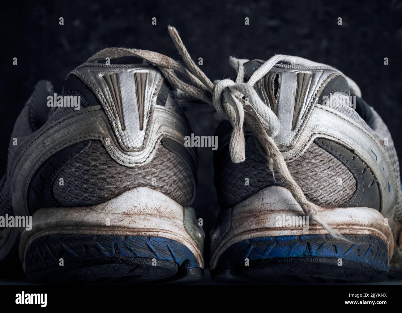 Back view of pair of old running shoes Stock Photo - Alamy