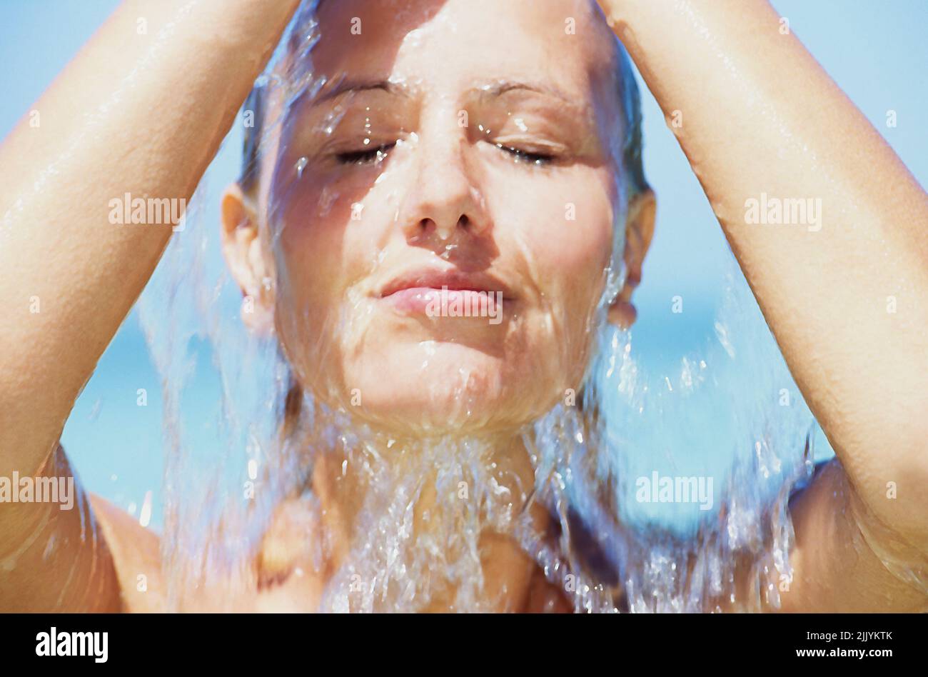 Woman splashing face hi-res stock photography and images - Alamy