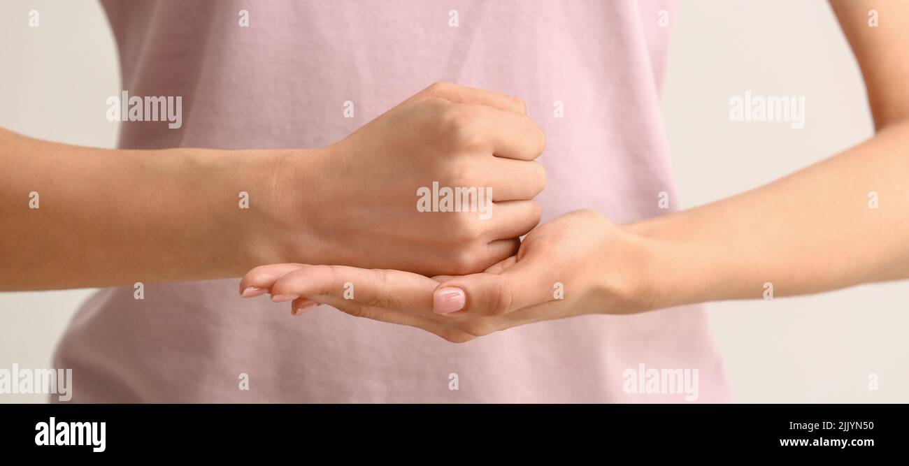 Young deaf mute woman using sign language, closeup Stock Photo - Alamy
