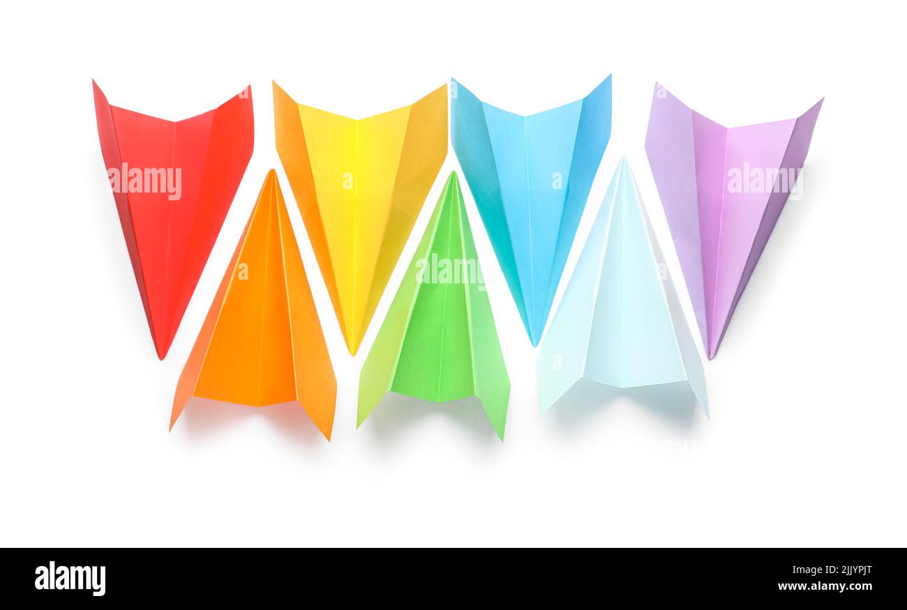 Colorful paper planes on white background Stock Photo - Alamy