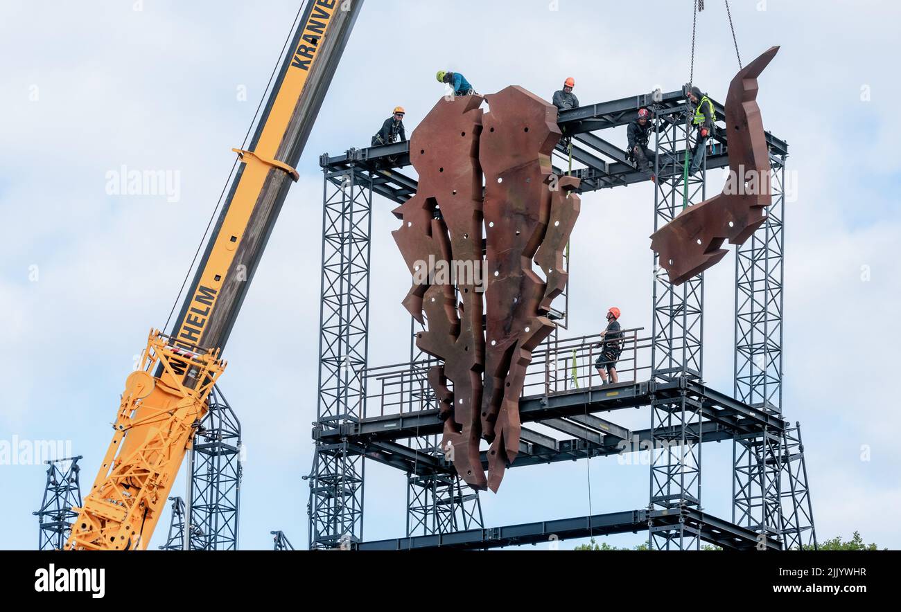 Wacken, Germany. 28th July, 2022. Workers mount the Wacken Skull, the ...