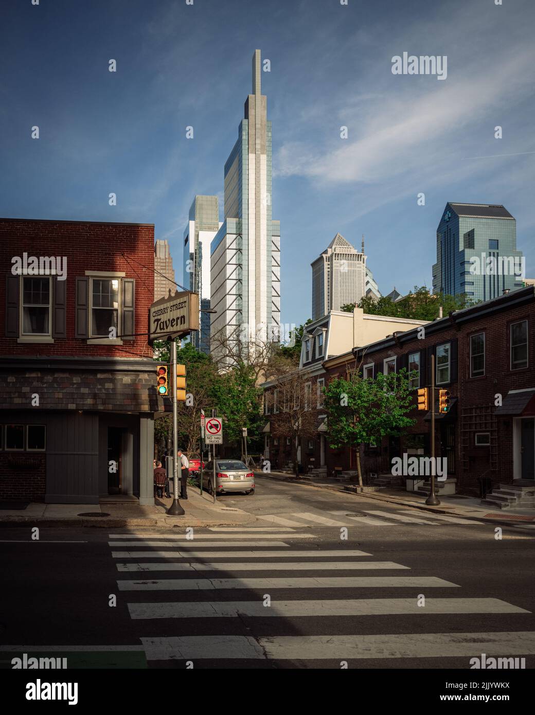 A vertical shot of a Philly skyline contrast with old buildings Stock ...