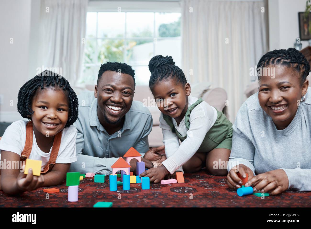 They know how to have fun as a family. Portrait of a happy family ...