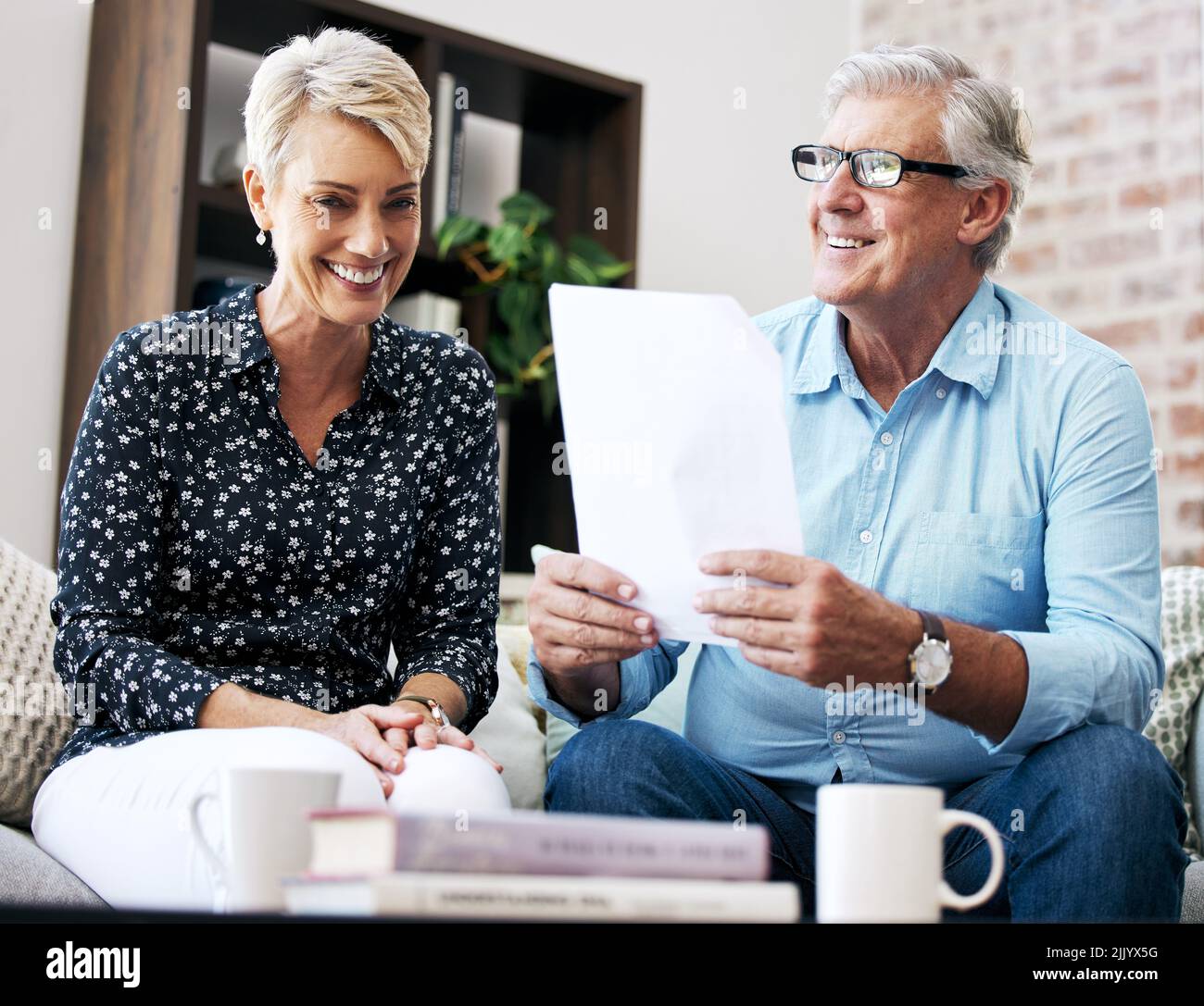 Its important to read the contract. a senior male realtor going through ...