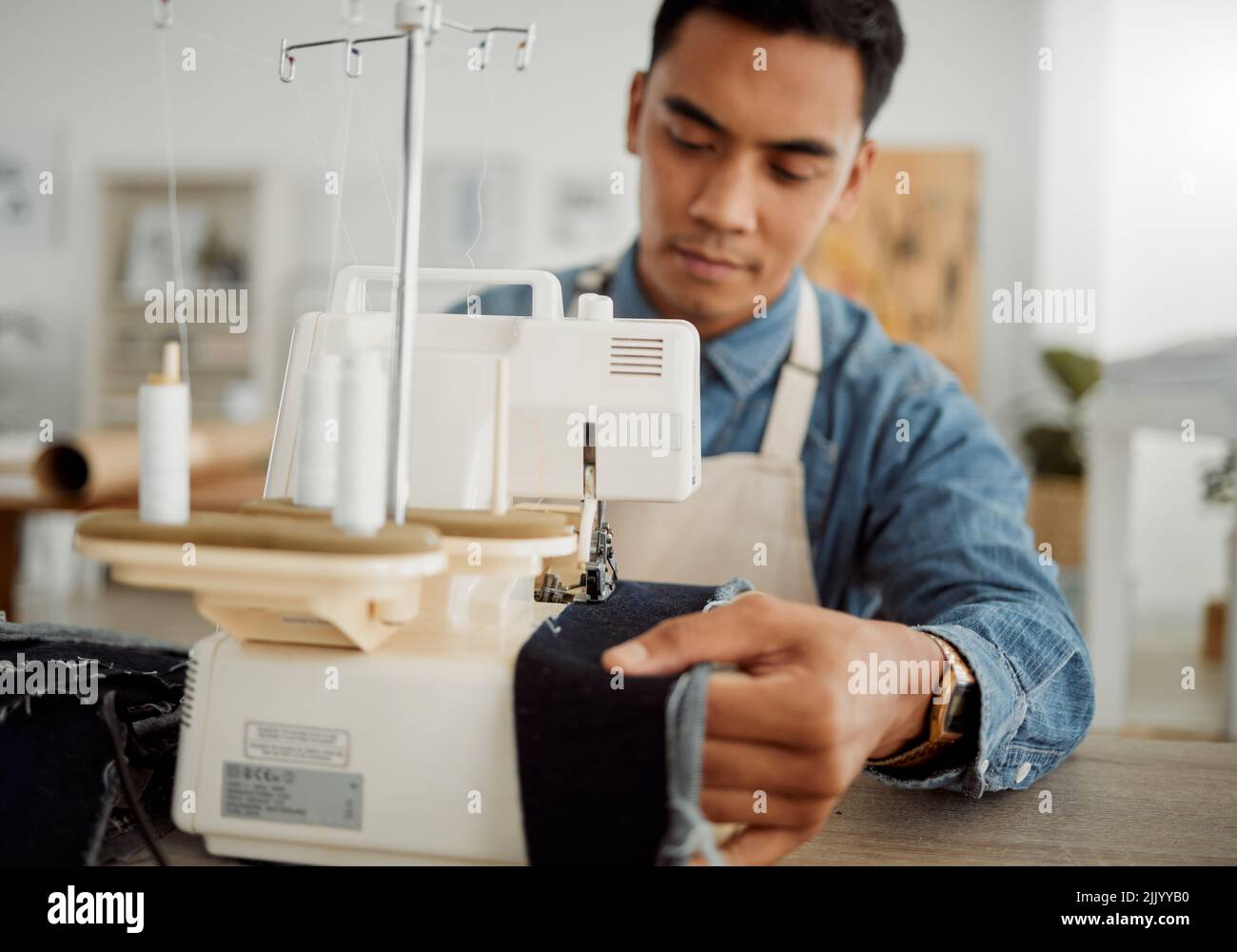 Sew clothes man hi-res stock photography and images - Alamy