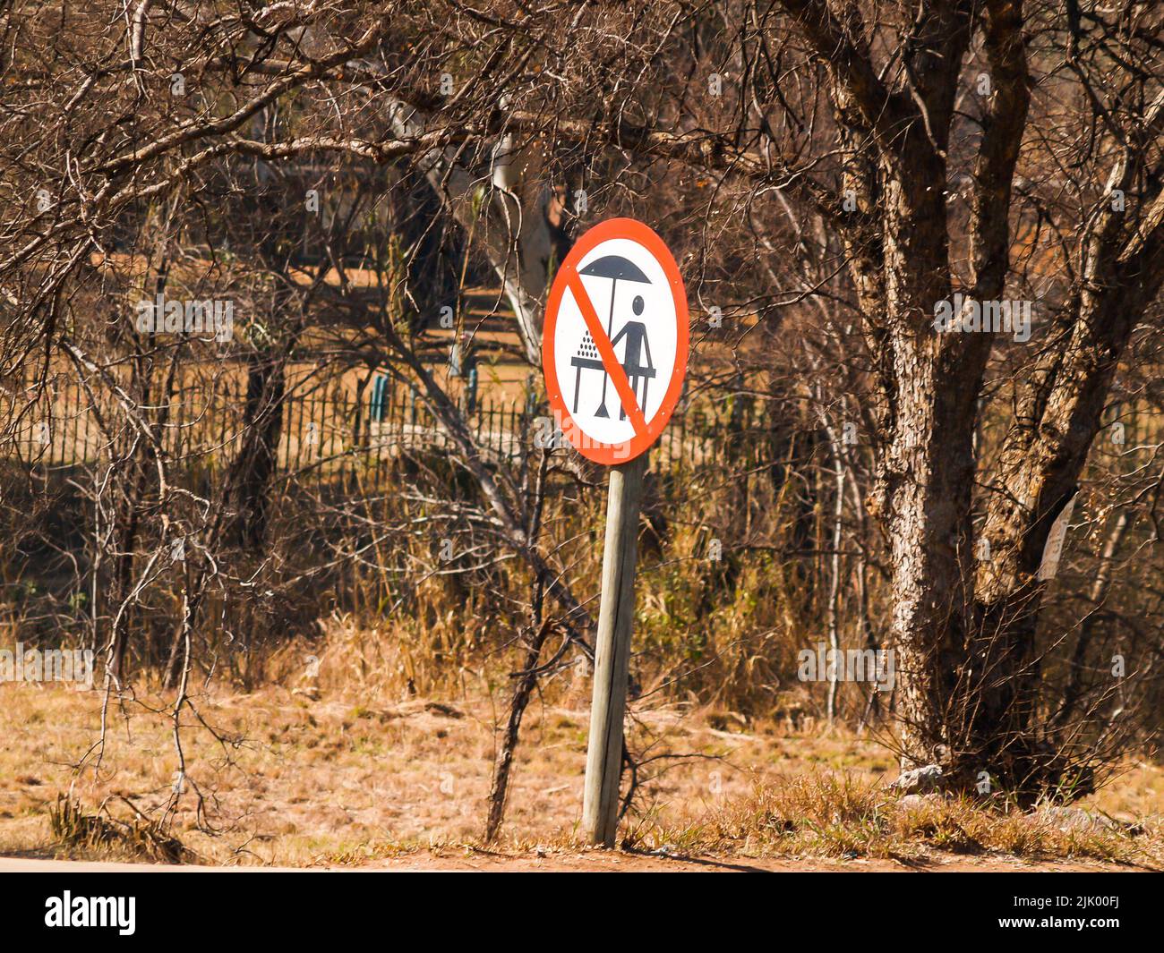 Road sign indicating a ban on roadside hawking in South Africa Stock ...