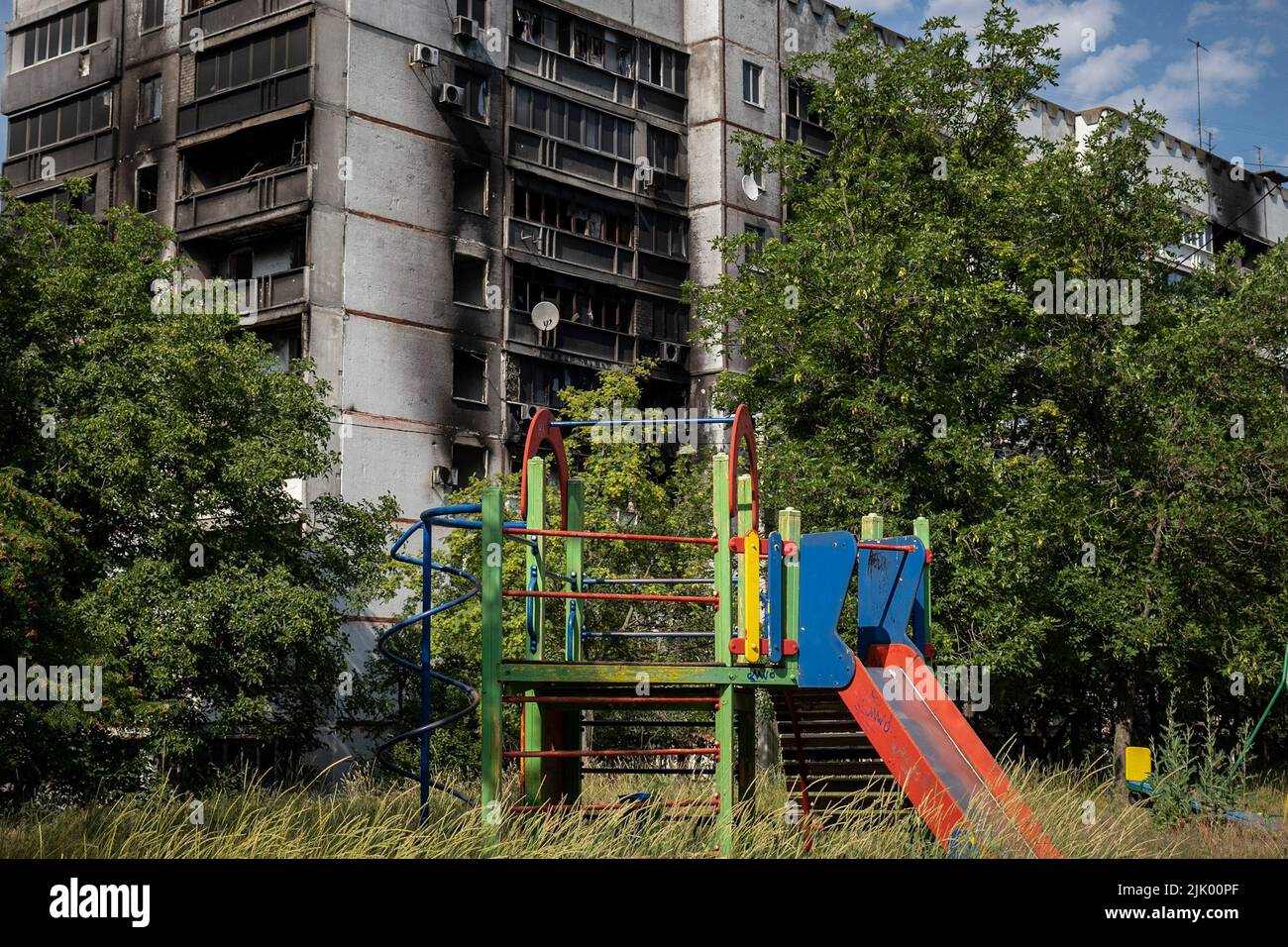 Children's playground seen in front of the residential buildings ...
