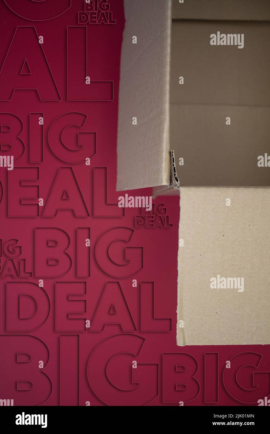 Big Deal word with cardboard box. Brown folded cardbox Stock Photo - Alamy