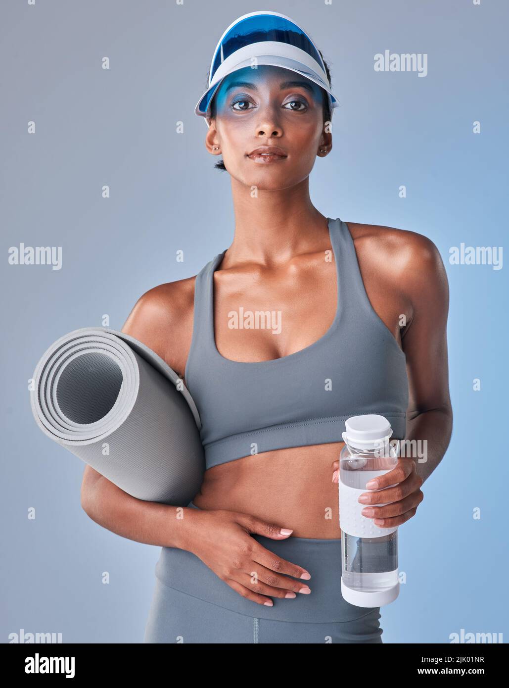 The most important ingredient in success is sweat. Studio shot of a fit ...