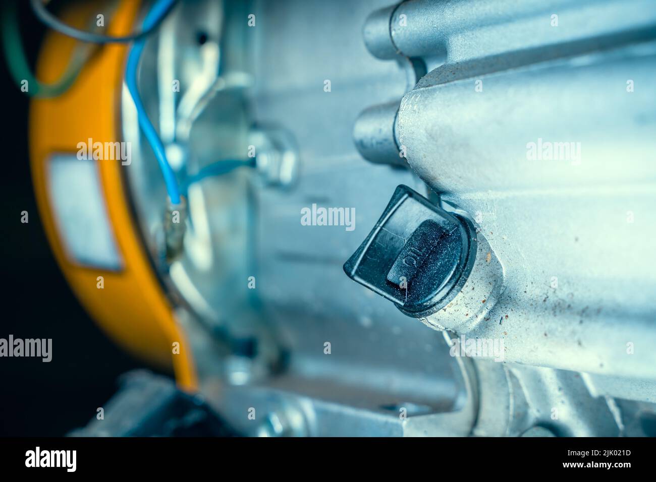 Oil filler cap of an electric gas generator close-up Stock Photo - Alamy