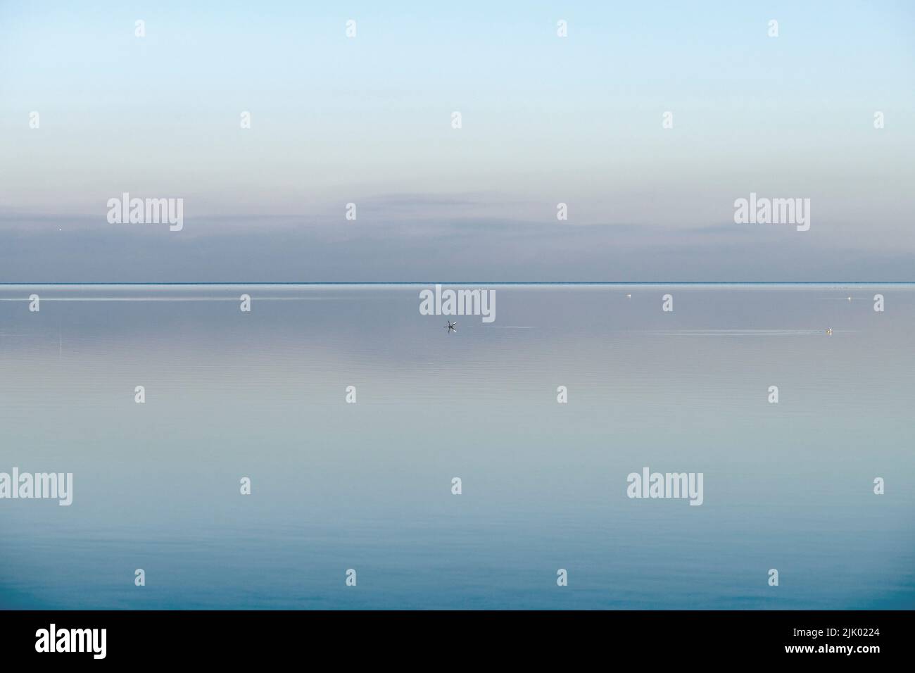 Calm, cool and relaxing front view of the ocean horizon, copy space on ...