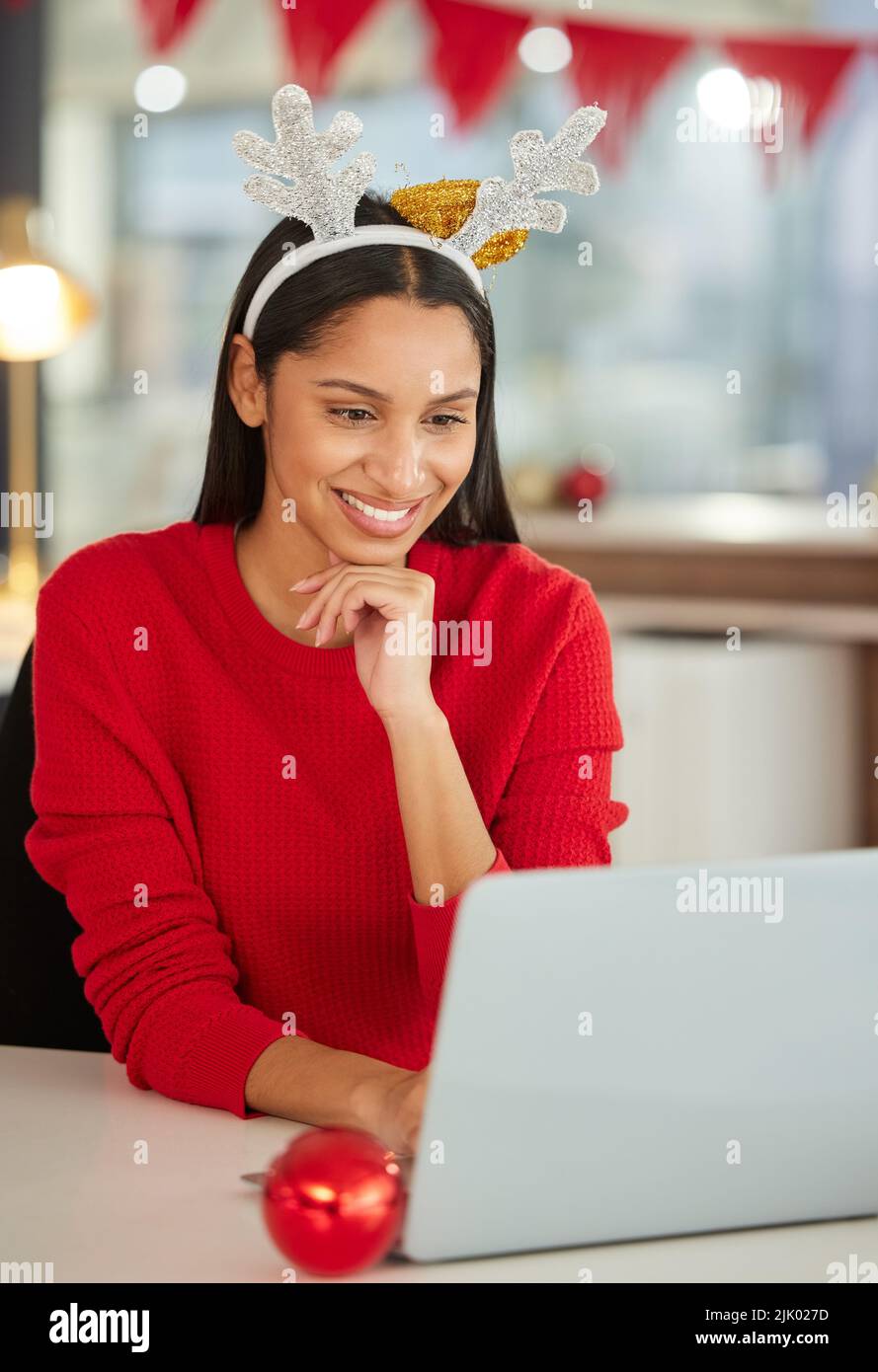 Our business is open for the Christmas break. a young businesswoman ...