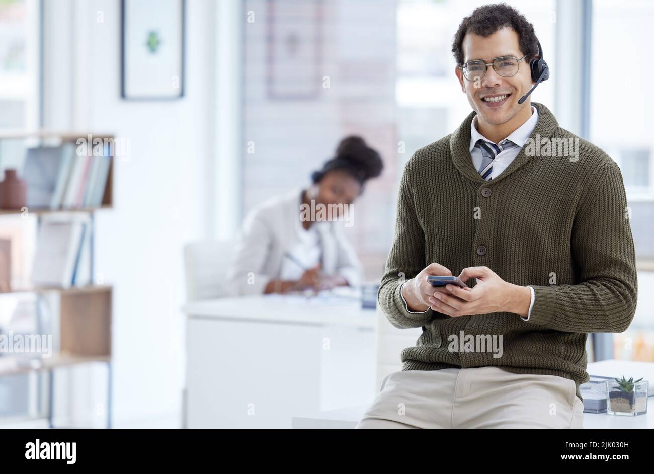 Businessman using headset while working hi-res stock photography and ...