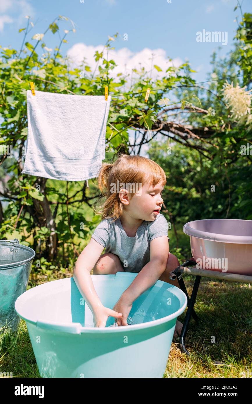 Child washes hi-res stock photography and images - Alamy