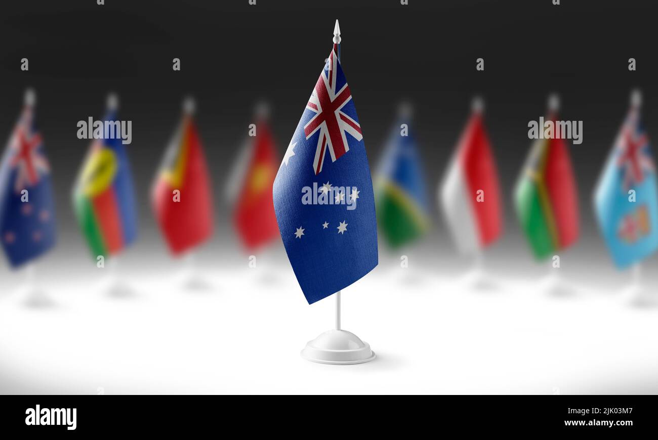 The national flag of the Australia on the background of flags of other ...