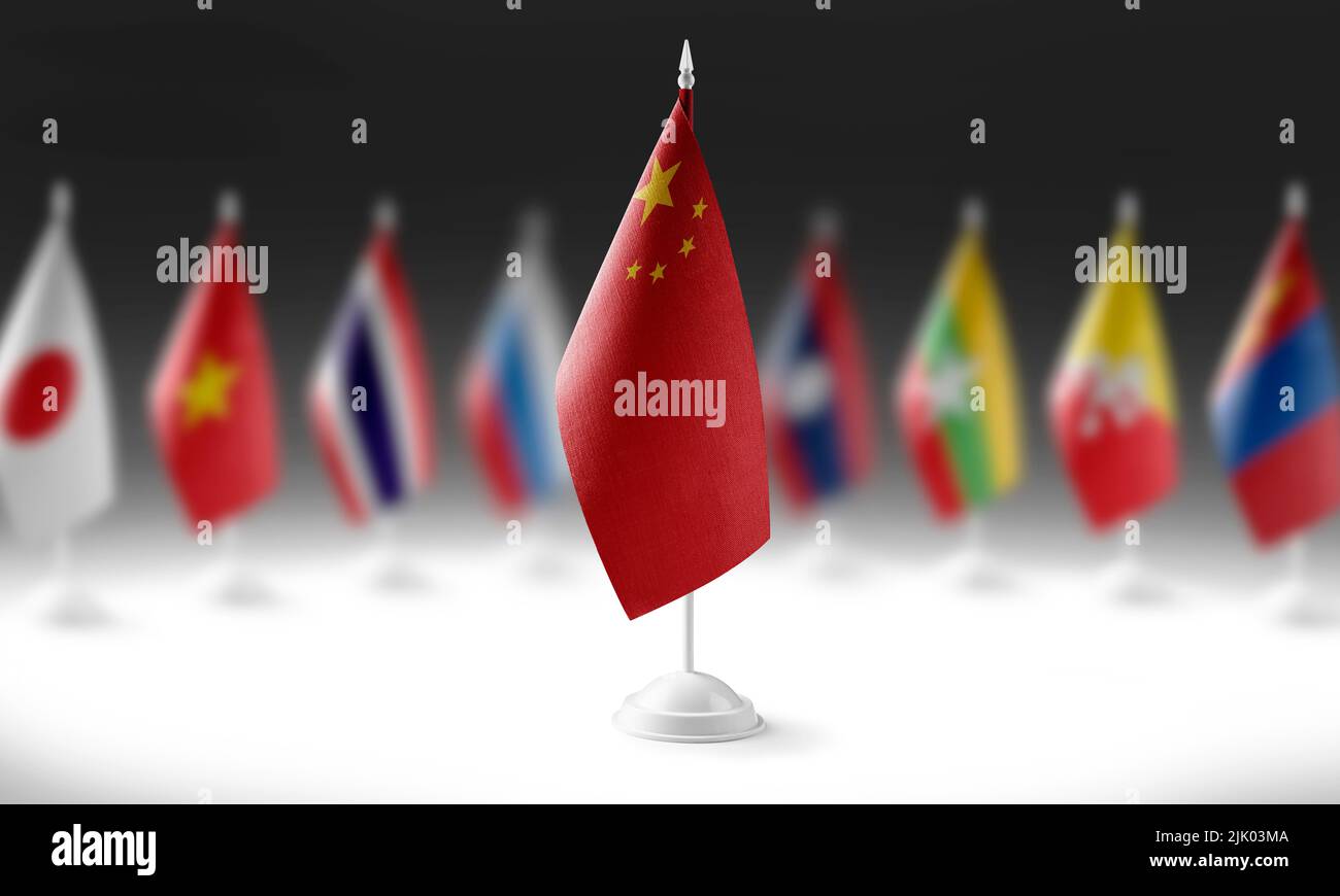 The national flag of the China on the background of flags of other ...