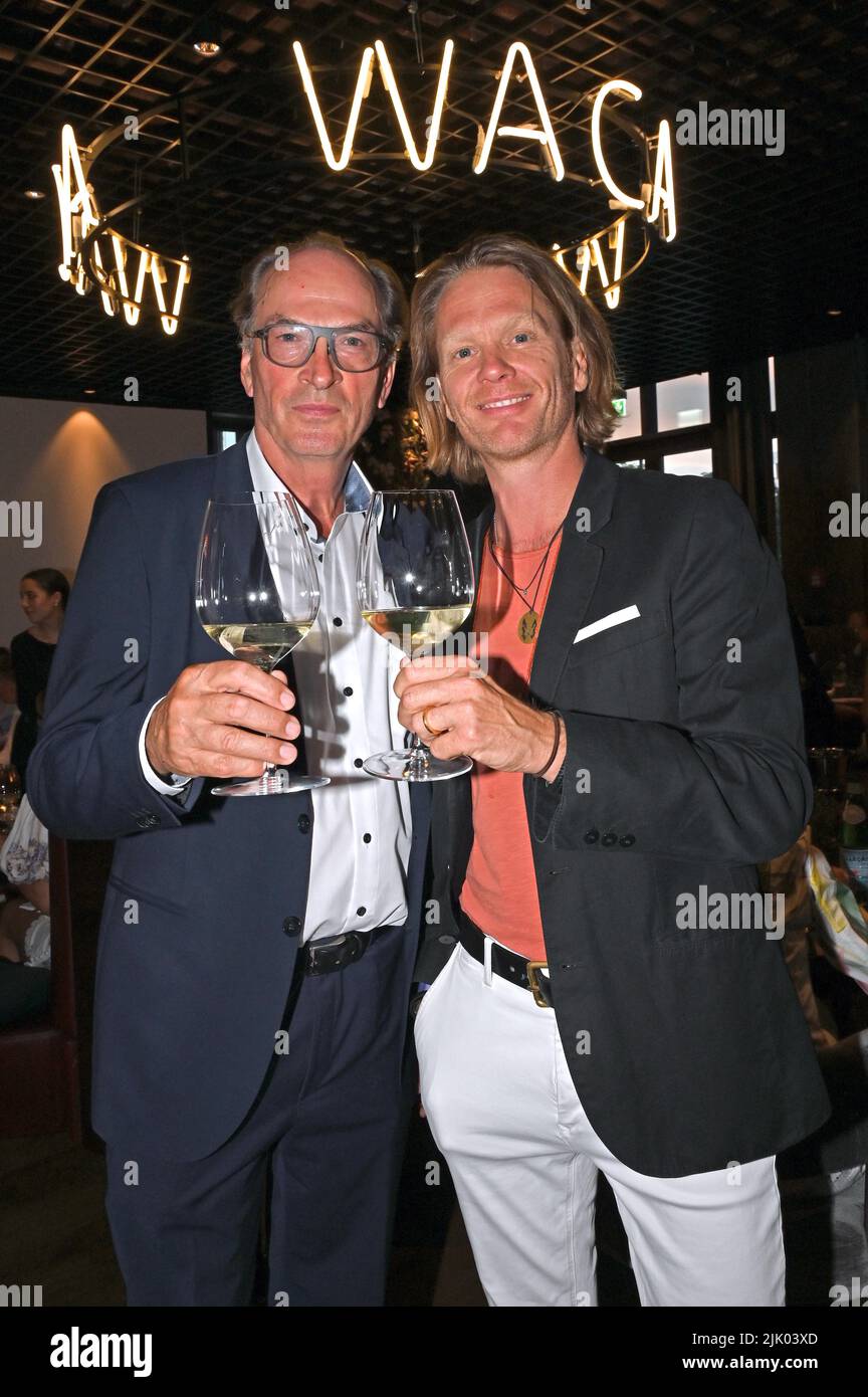 Munich, Germany. 28th July, 2022. Musician Mike Kraus (r) and actor ...