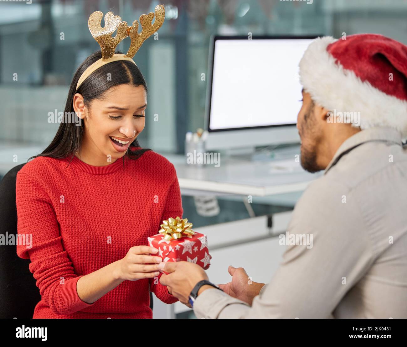 Santa couldnt keep it a secret this year. a young businessman and ...