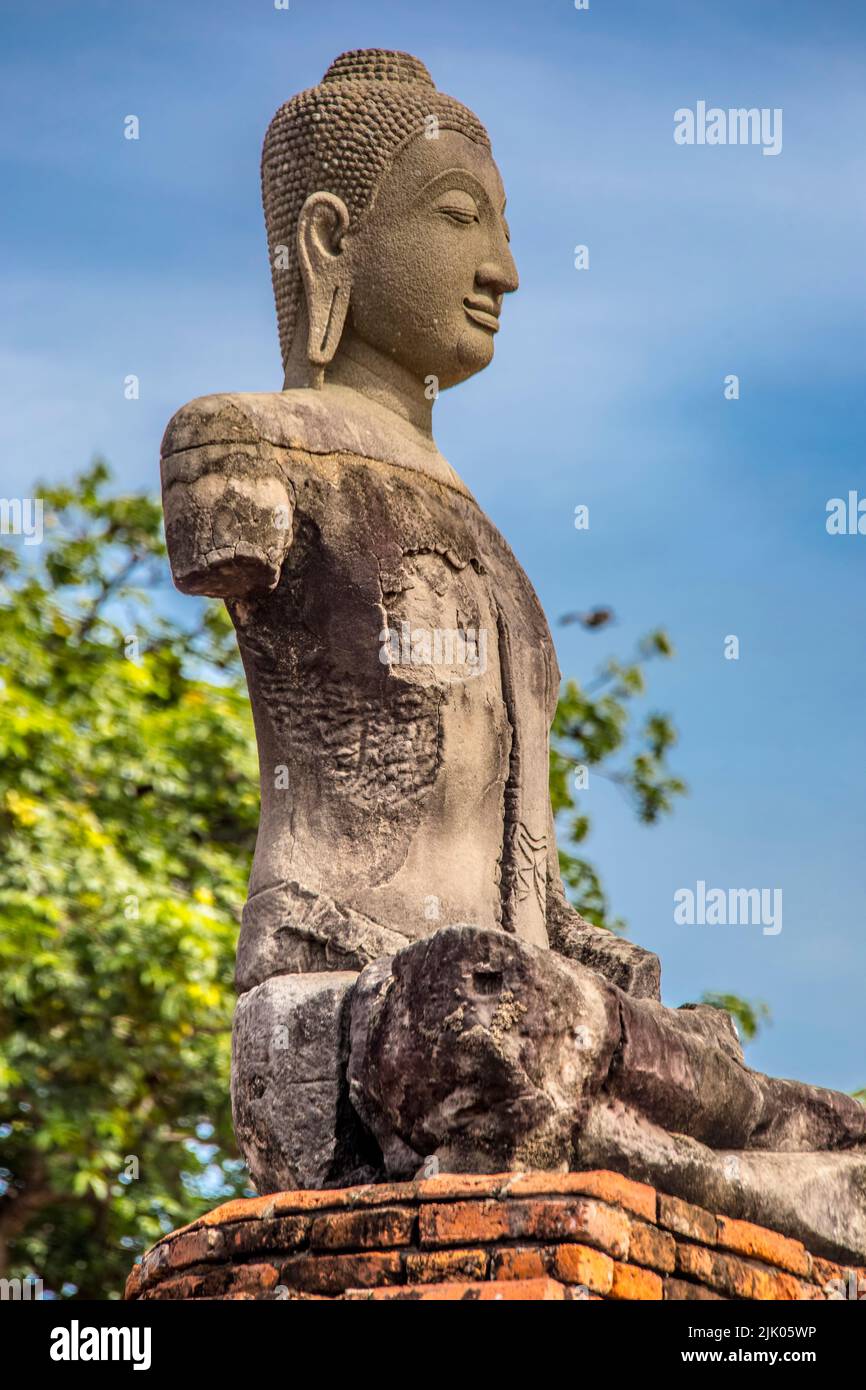 The broken Buddha statue in Wat Chaiwatthanaram. A Buddhist temple in ...