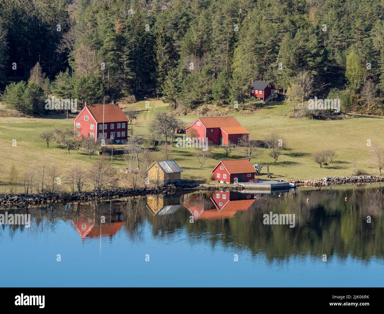 Farm with red houses on an island near Risor, norwegean southern coast ...