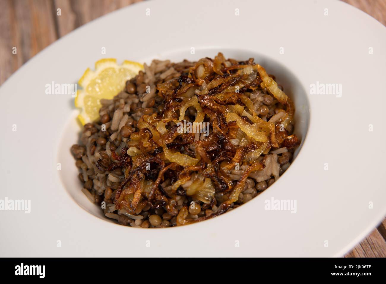 VEGAN LEBANESE LENTILS WITH GOLDEN ONIONS AND RICE RECIPE , MDARDARA B'RIZ Stock Photo - Alamy
