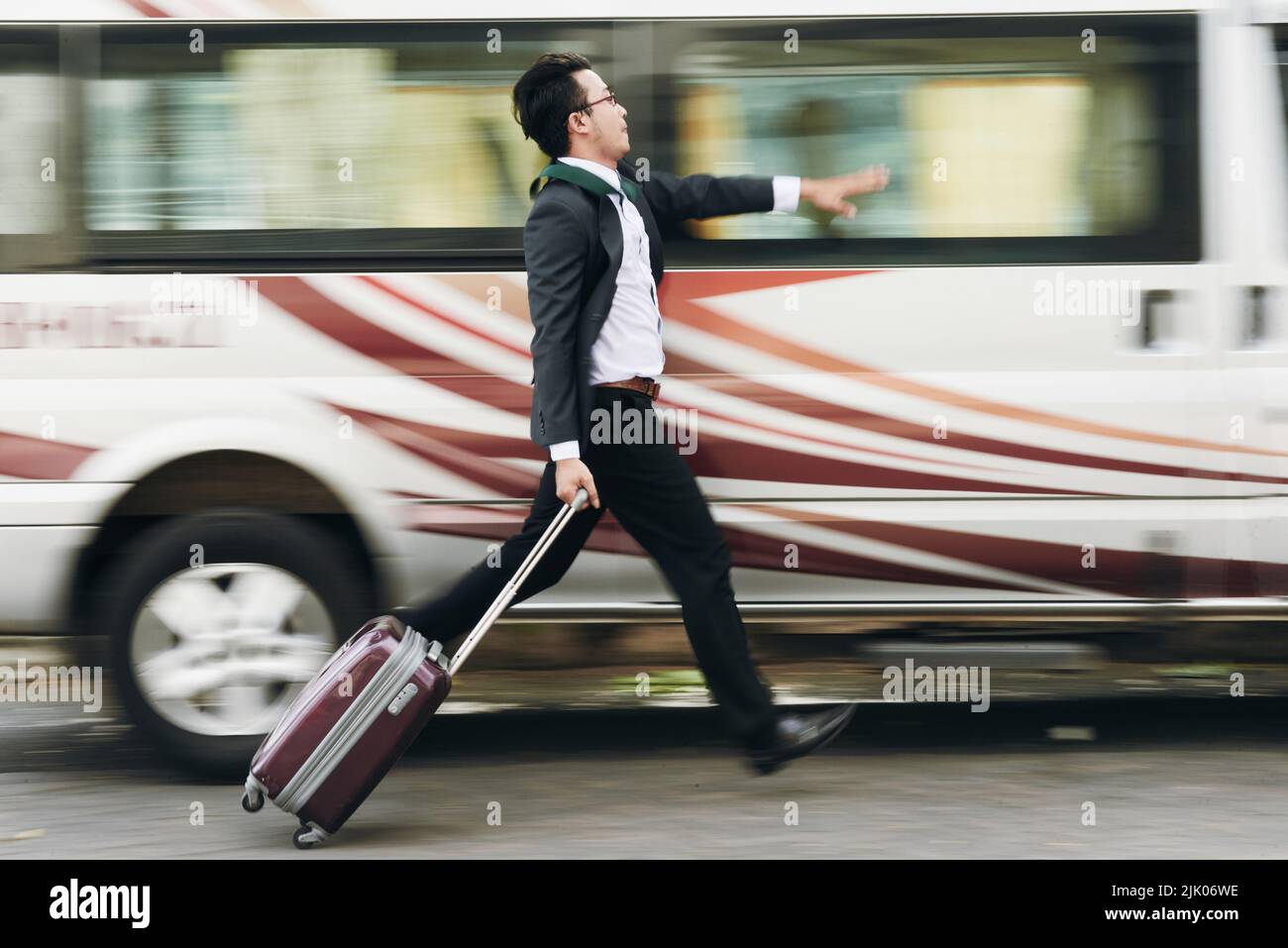 Running late for bus hi-res stock photography and images - Alamy
