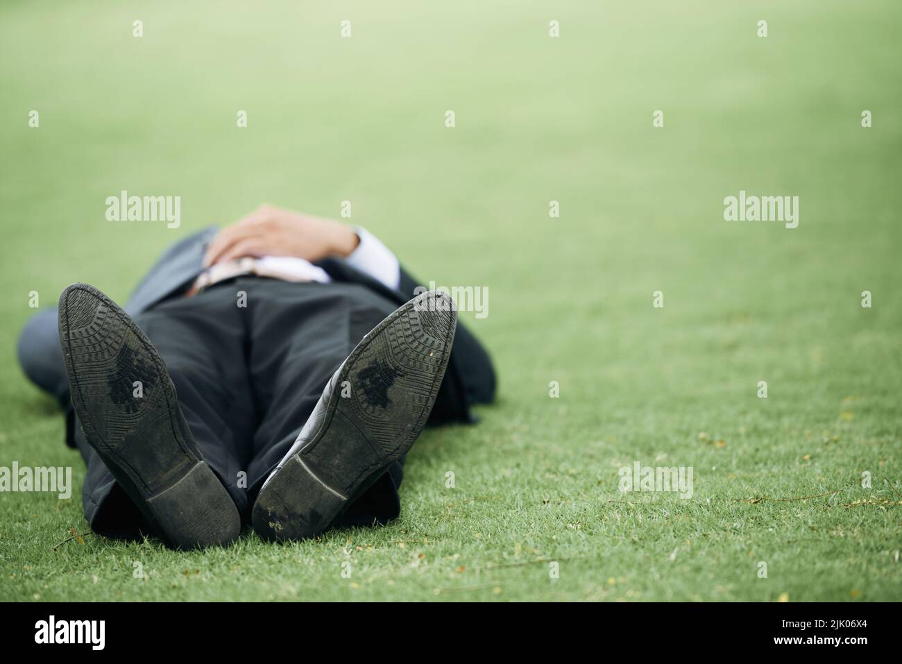 Exhausted male executive resting hi-res stock photography and images ...