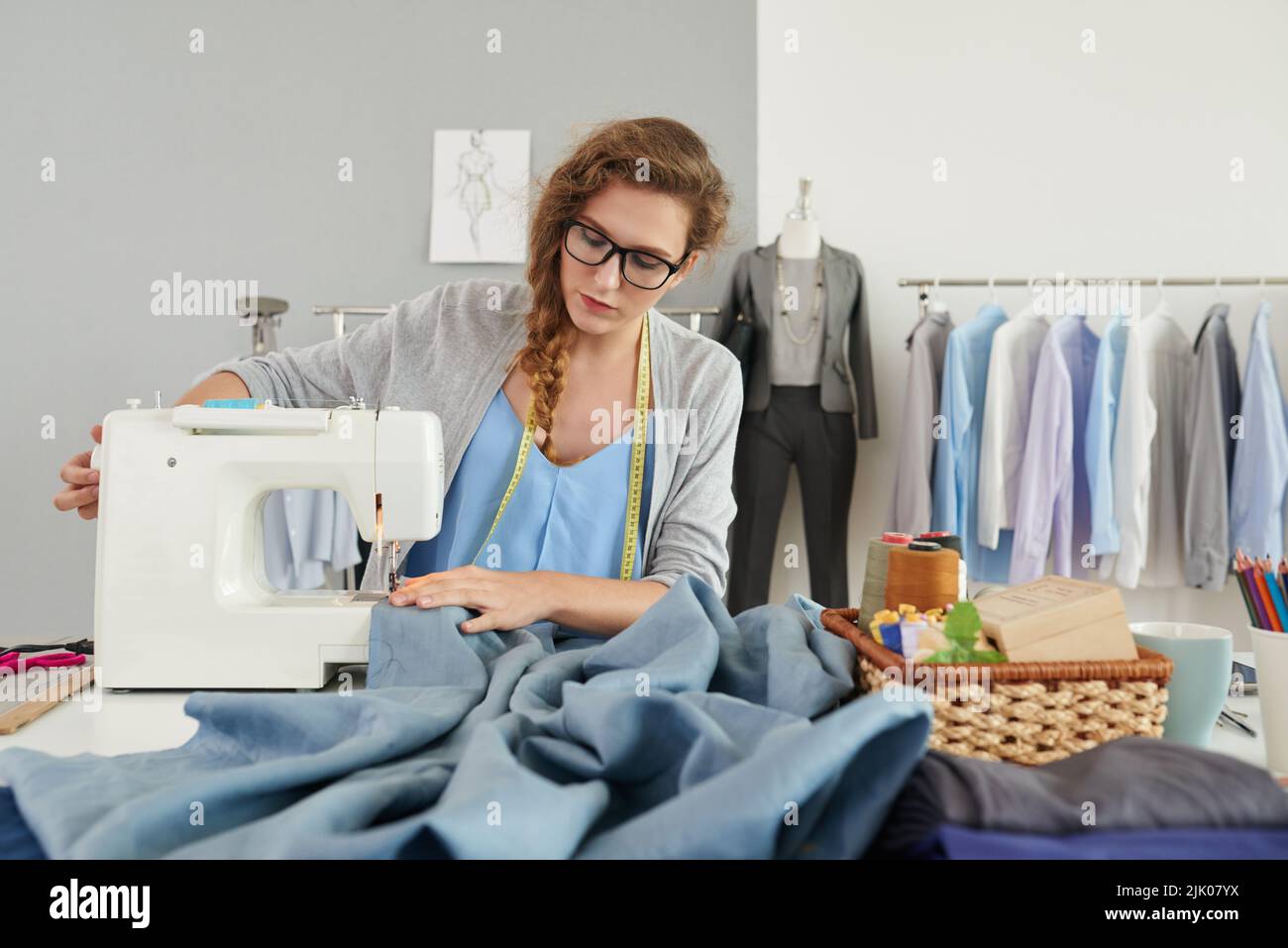 Woman sewing on electric machine hi-res stock photography and images ...
