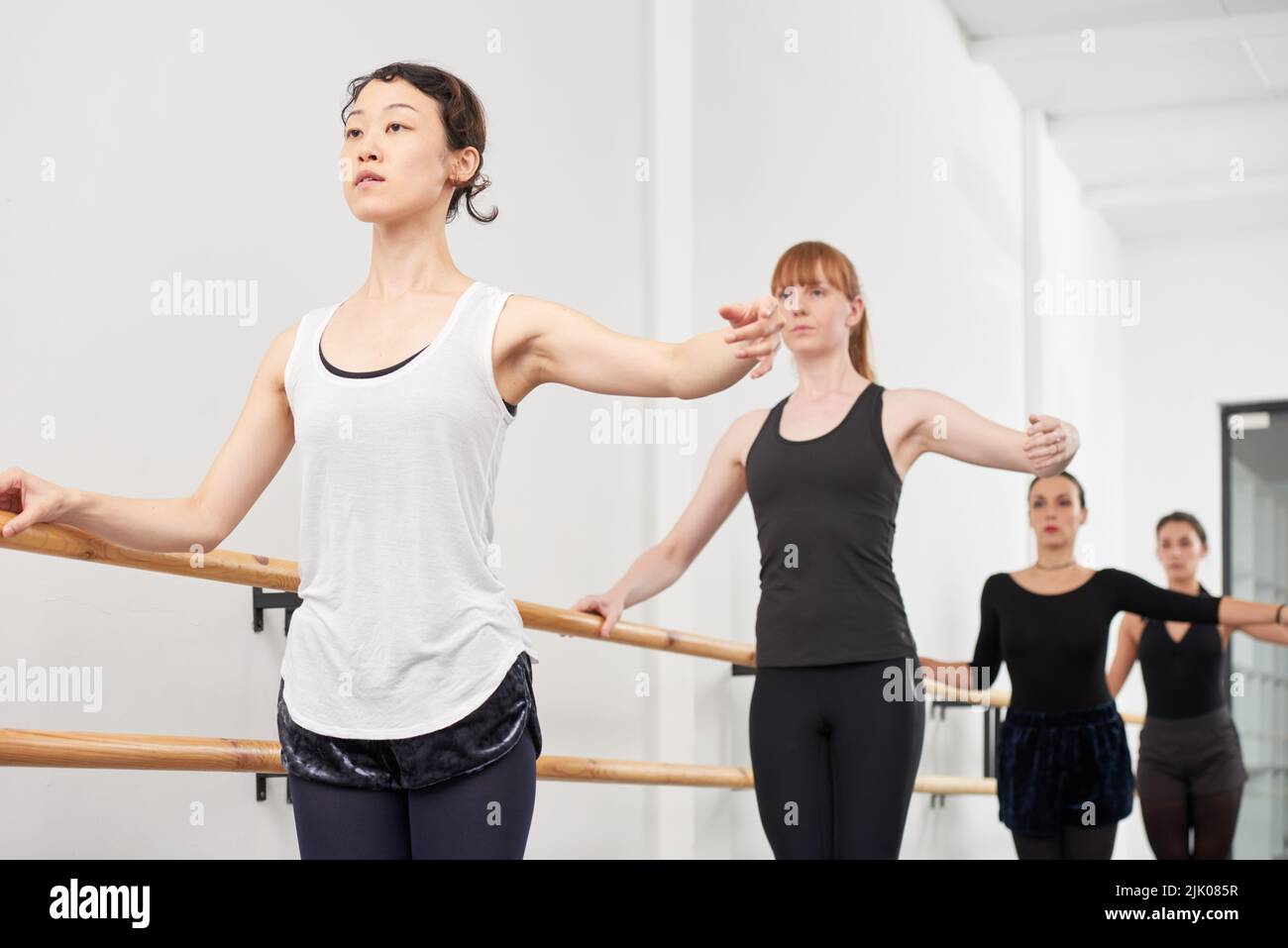Women practicing ballet movements in the class Stock Photo - Alamy