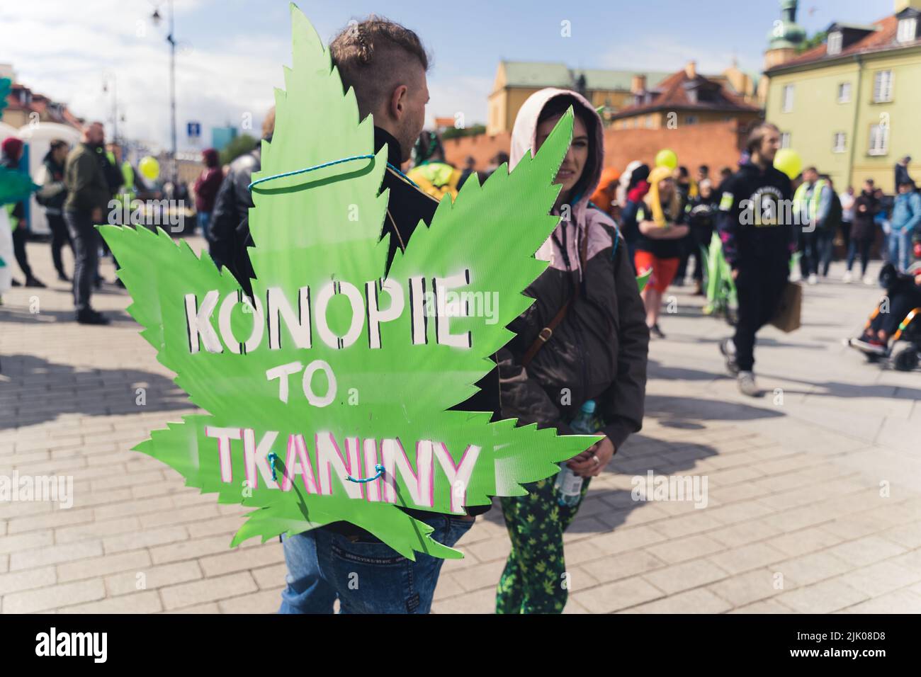 Cannabis equals fabric. Creative home-made cardboard poster in the ...
