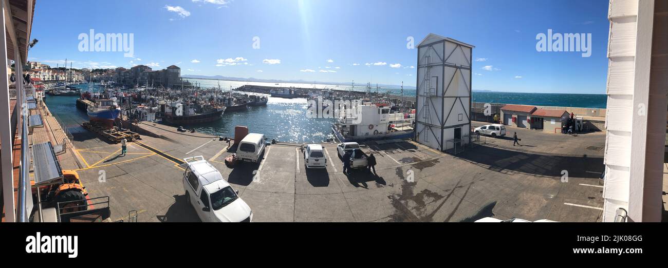 A Panoramic view of a ship port in front of a parking lot Stock Photo ...