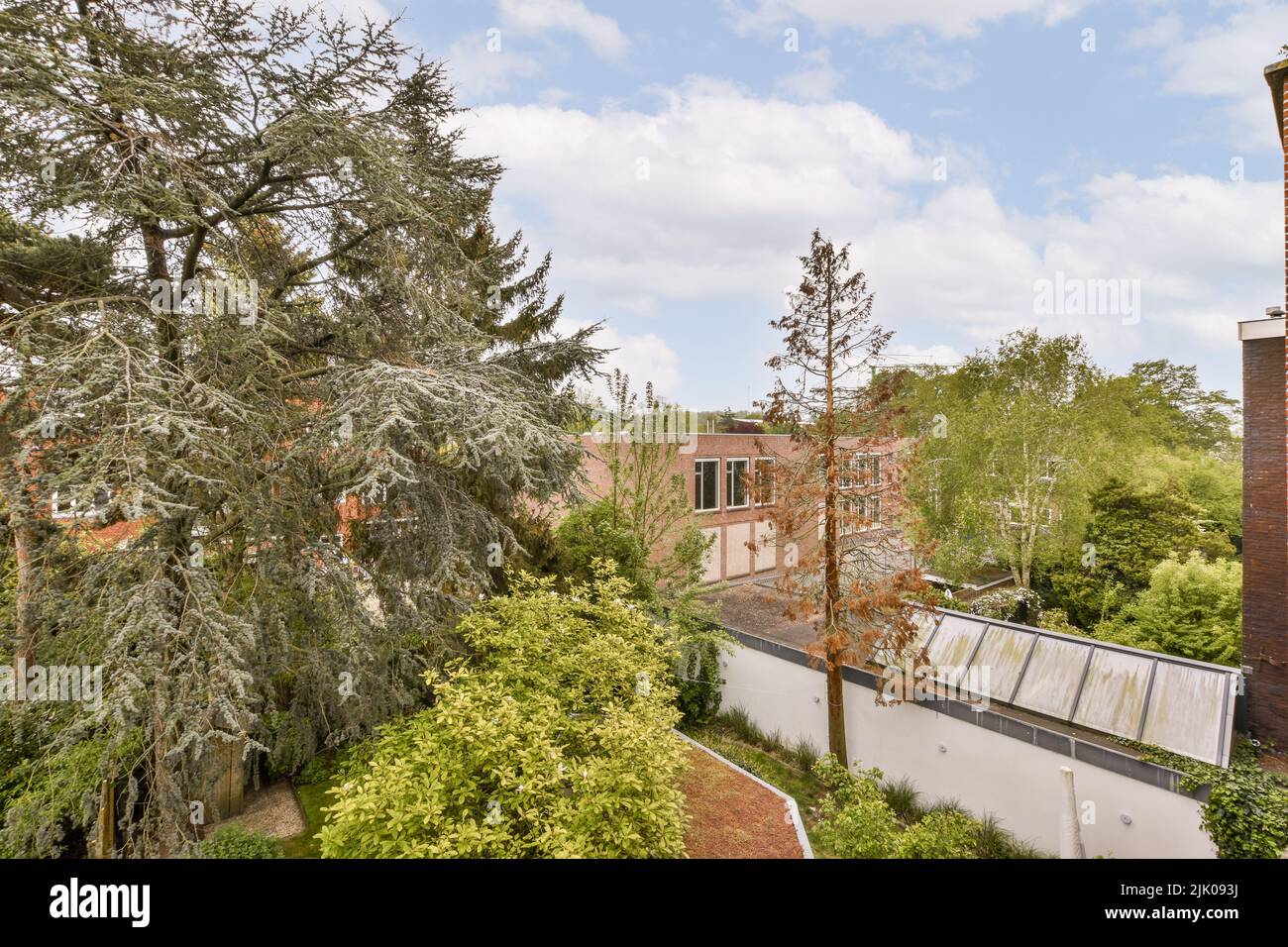 Panoramic view of high rise buildings and trees from height Stock Photo ...