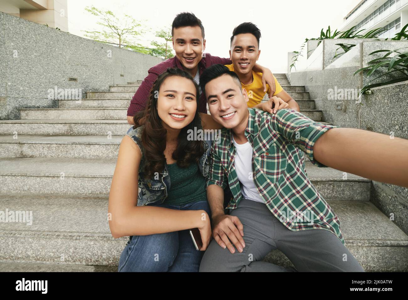 Group people posing in hi-res stock photography and images - Alamy