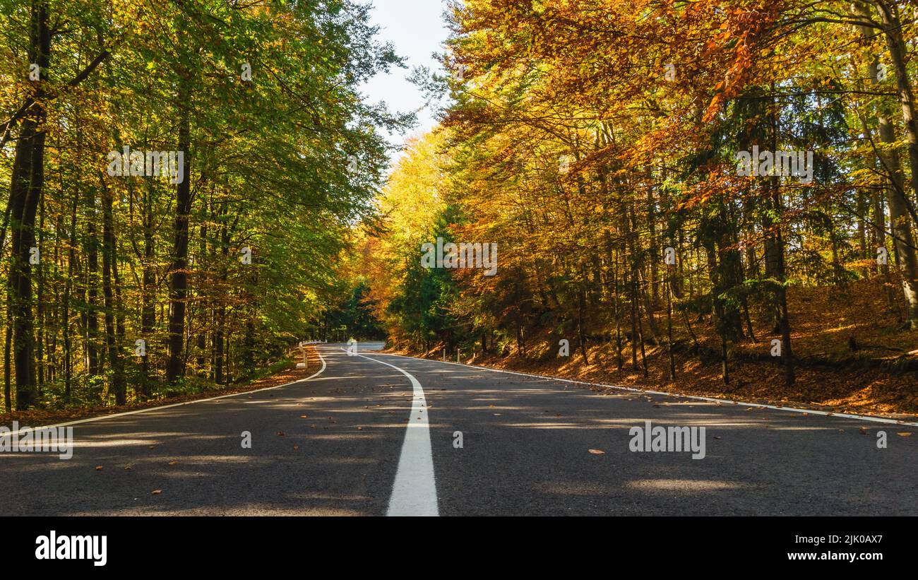 A beautiful view of the Transfagarasan Highway surrounded by colorful ...