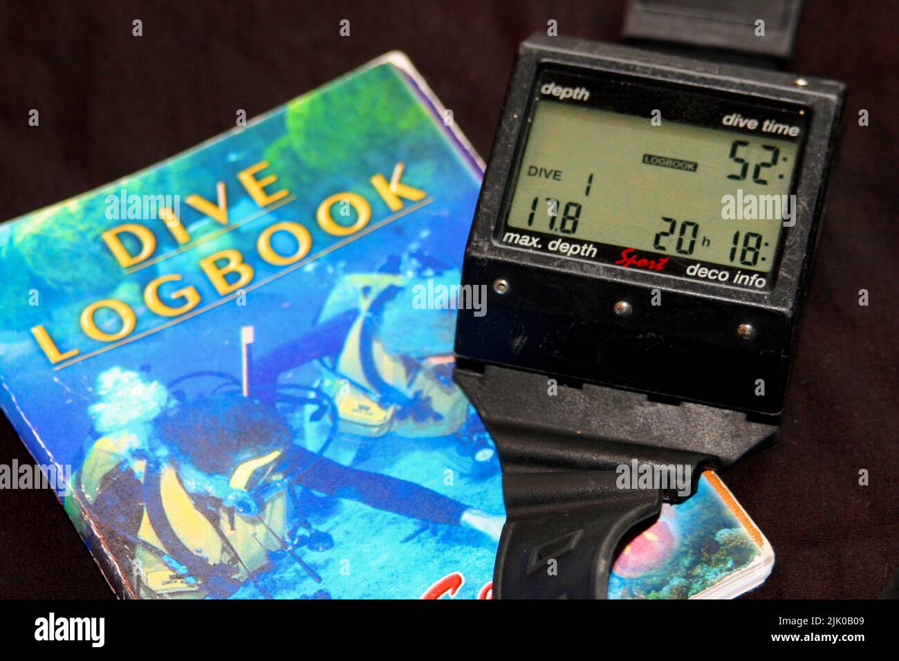 diving computer and divie logbook Stock Photo - Alamy