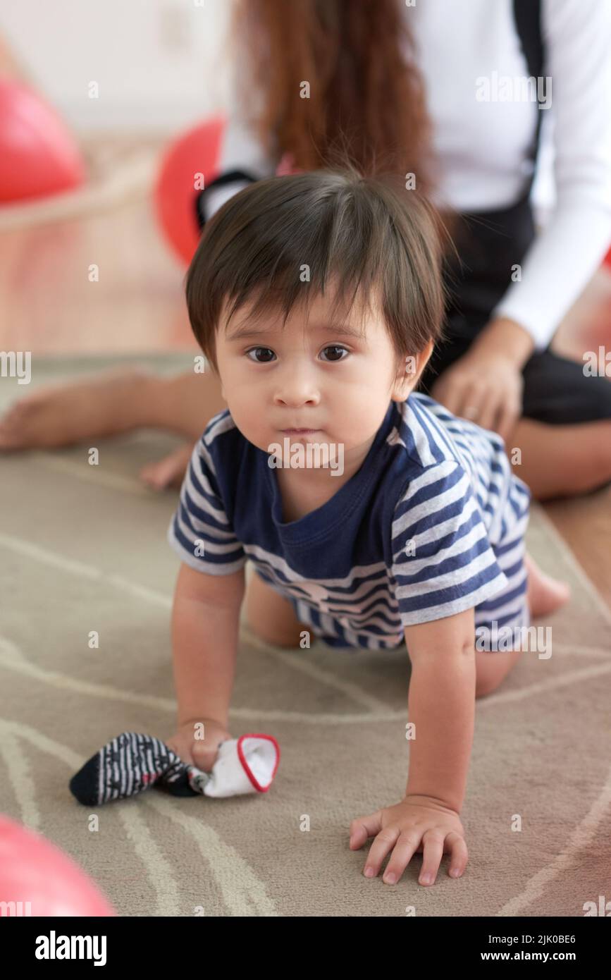 Vietnamese toddler boy crawling on the floor Stock Photo - Alamy
