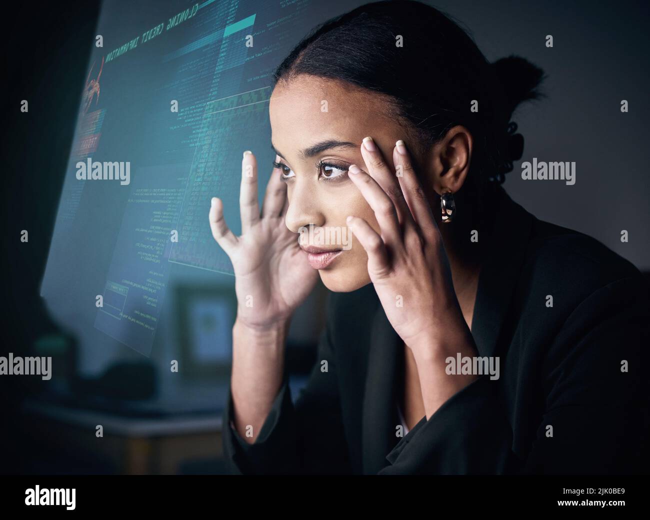 This is not promising data. an attractive young businesswoman sitting ...