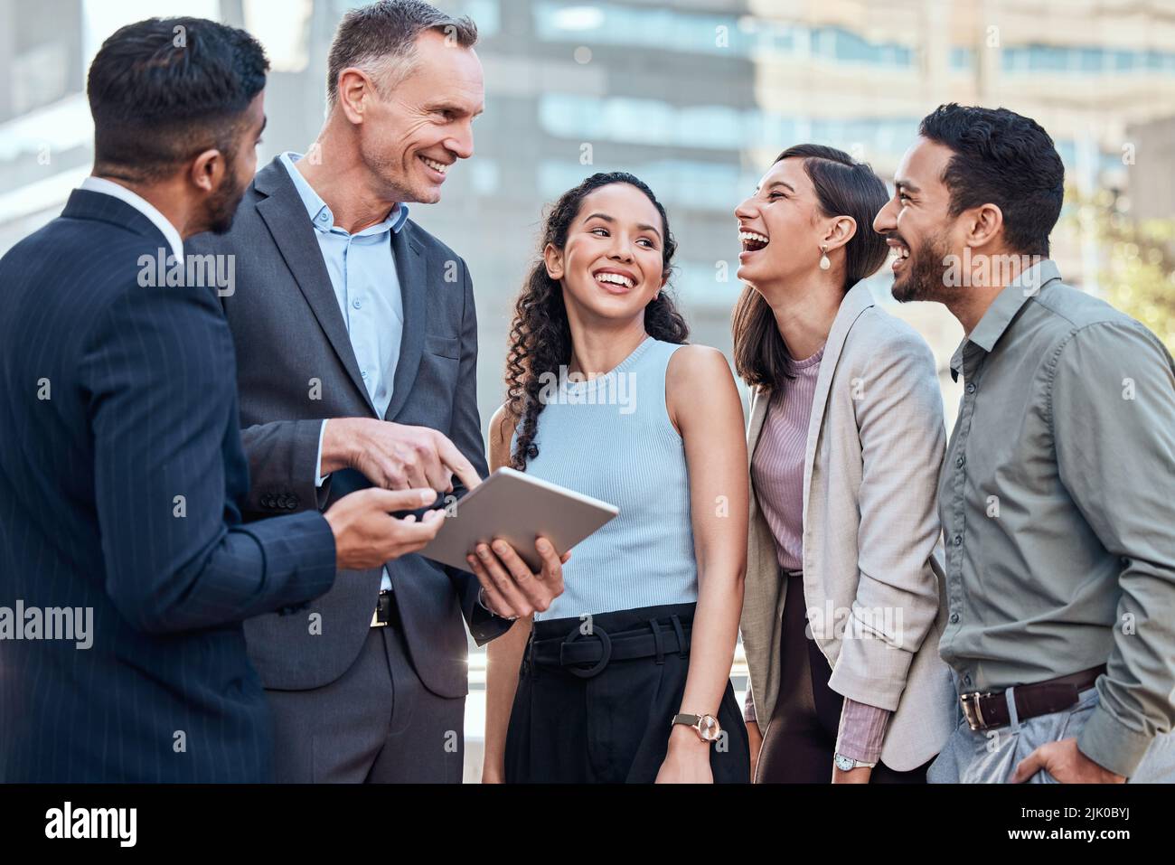 Colleagues who get along together succeed together. a diverse group of ...