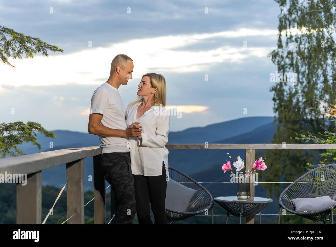 beautiful young couple enjoying nature at mountain Stock Photo - Alamy