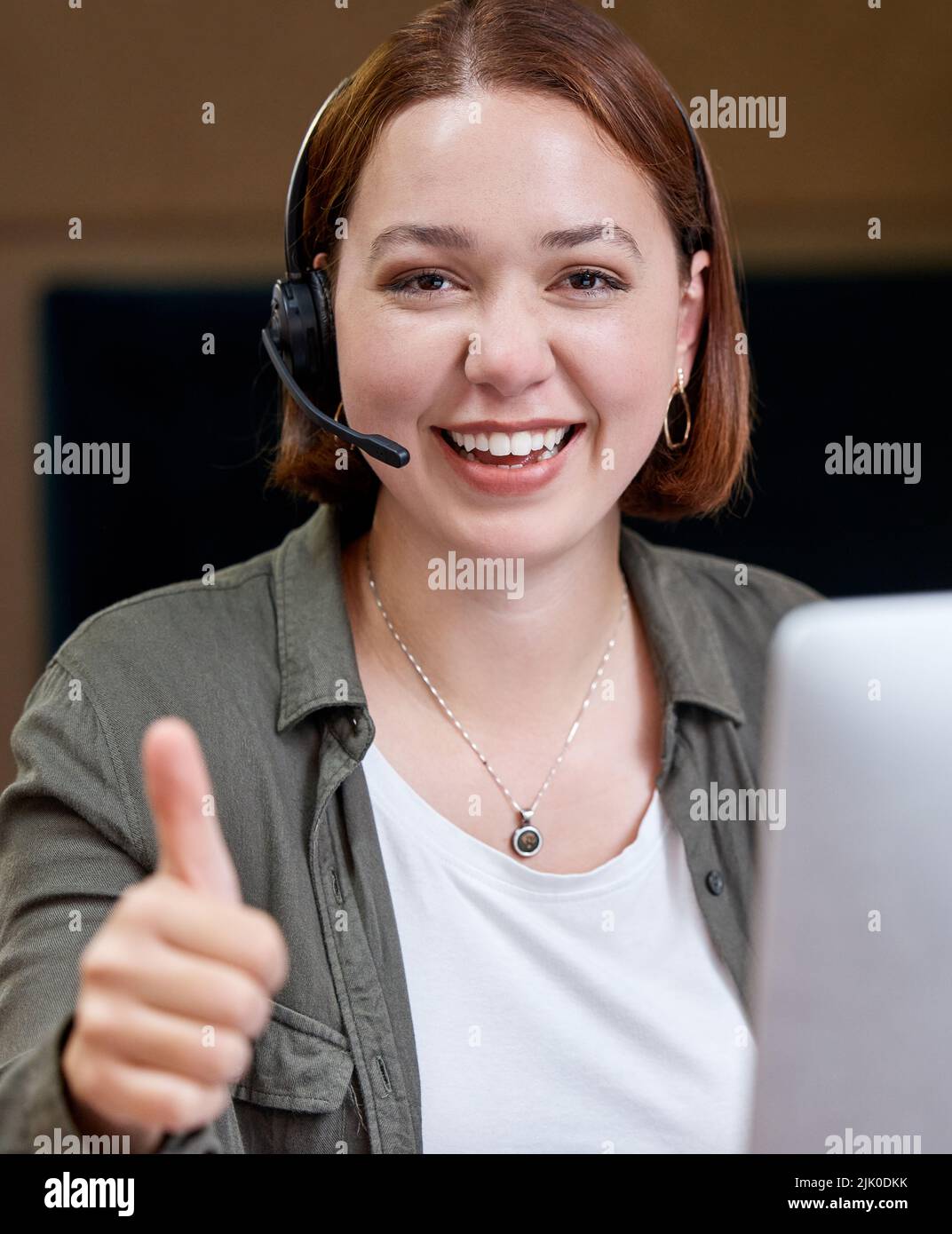 Ive got you covered. a young call centre agent sitting alone in the ...